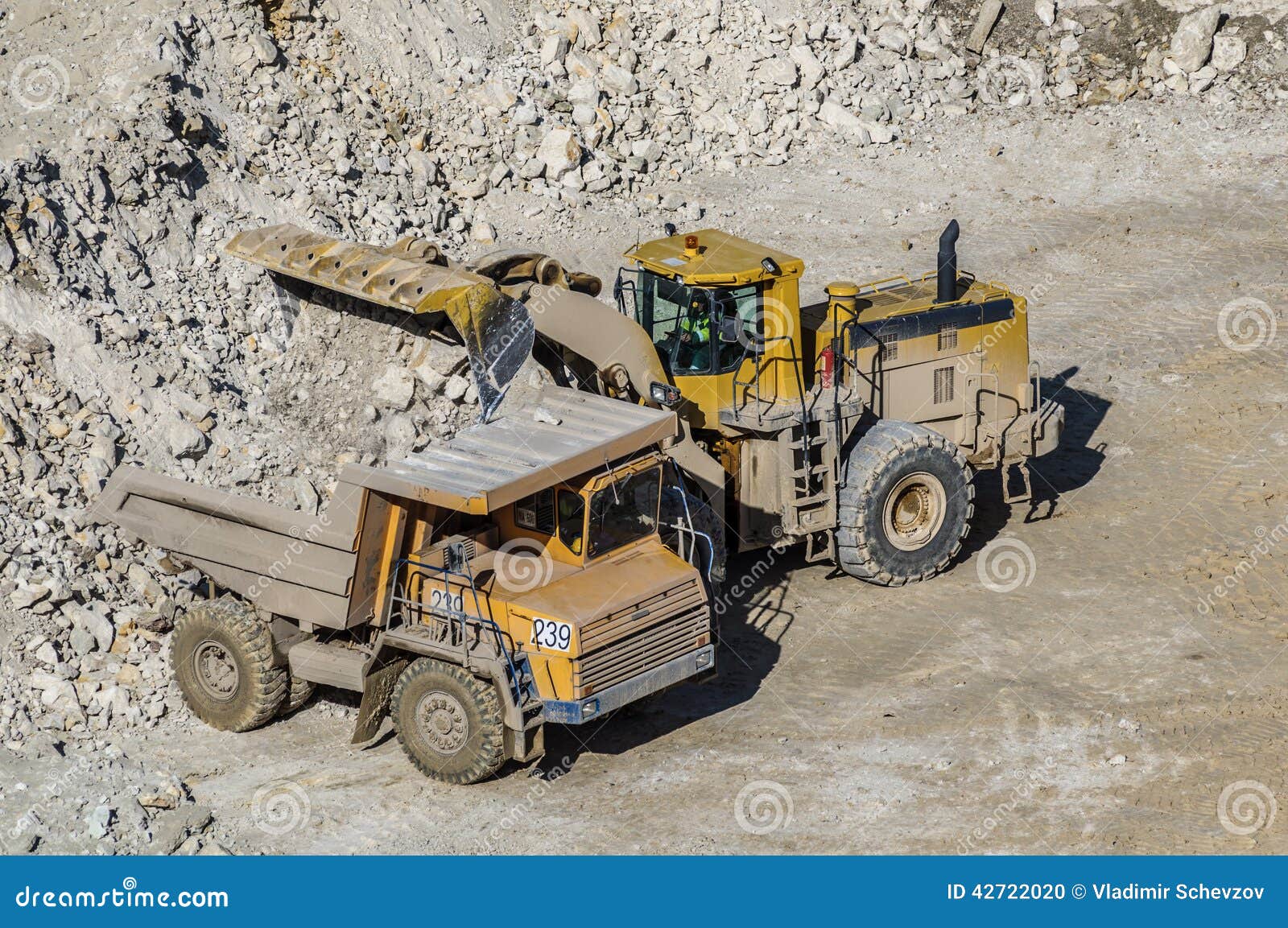 Loading of Gypsum in Mining Truck Stock Photo - Image of equipment ...