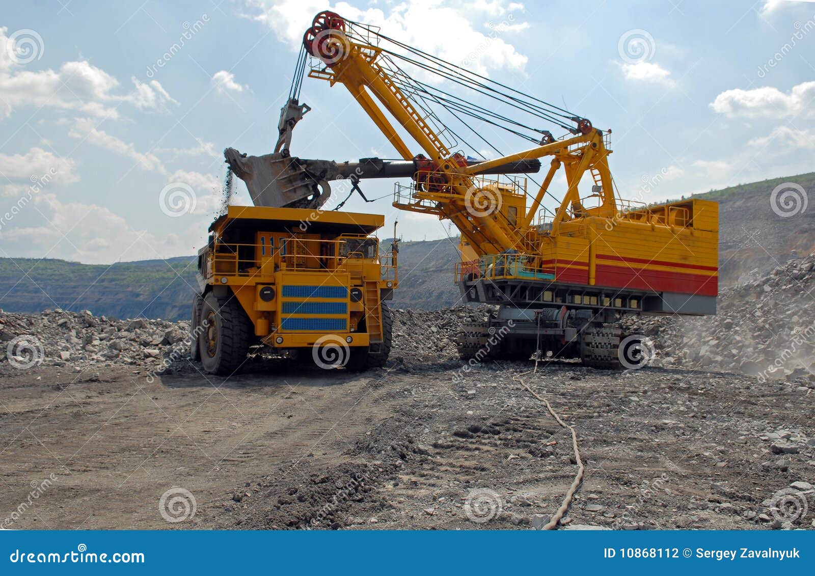 Loading of iron ore stock photo. Image of hydraulic, trucks - 10868112
