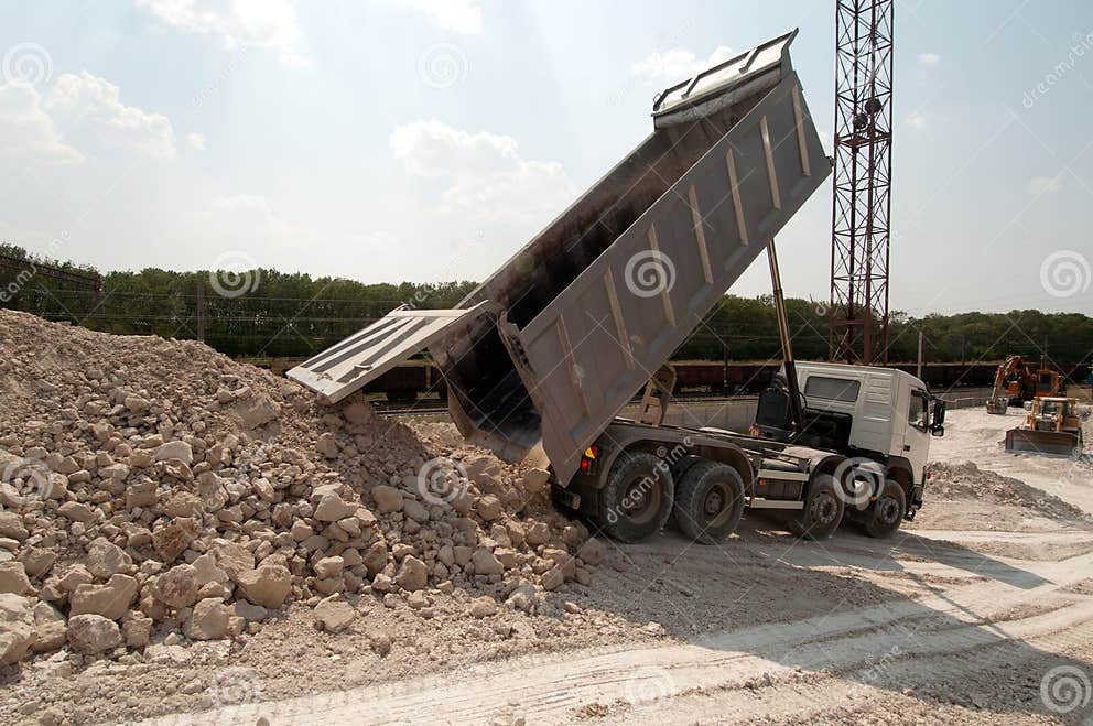 Loading a Large Lorry Building Material Stock Image - Image of machine ...