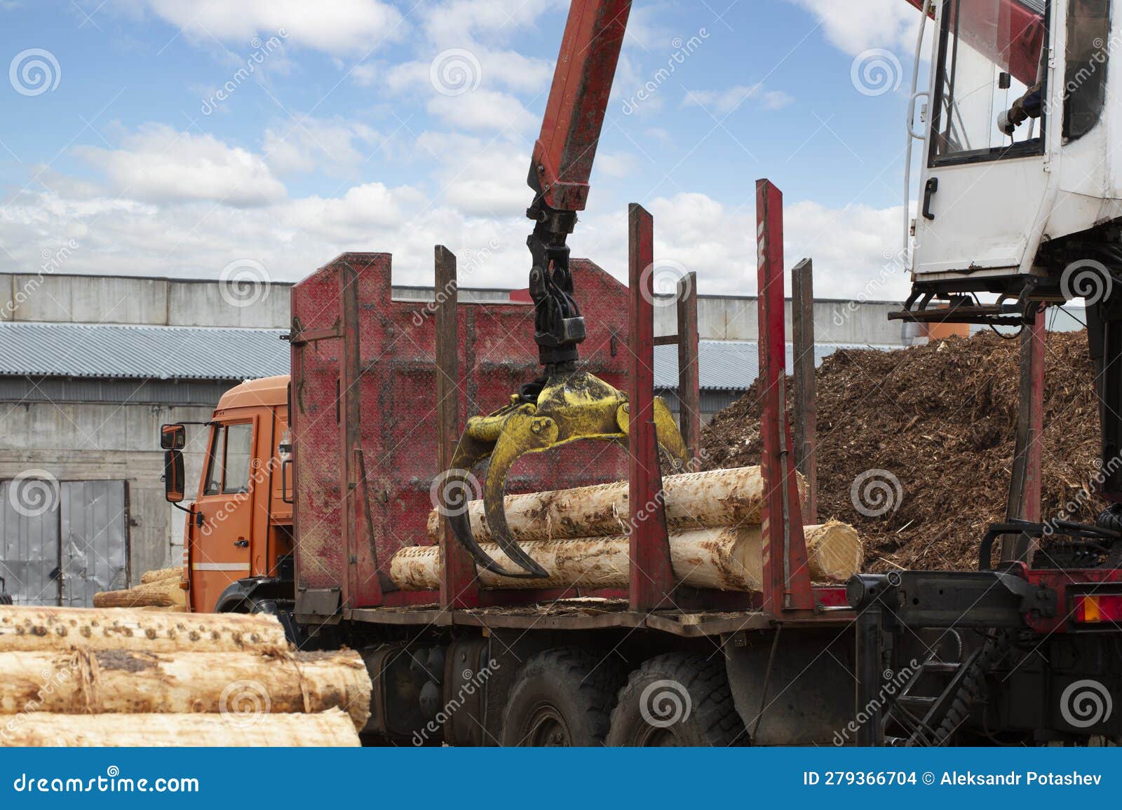 Loading Logs With A Special Loader.Timber Products Warehouse On A ...