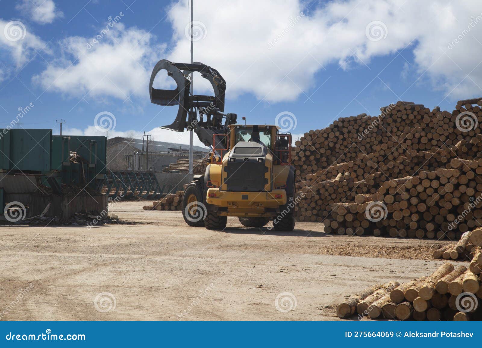 Loading Logs with a Special Loader.Timber Products Warehouse on a ...
