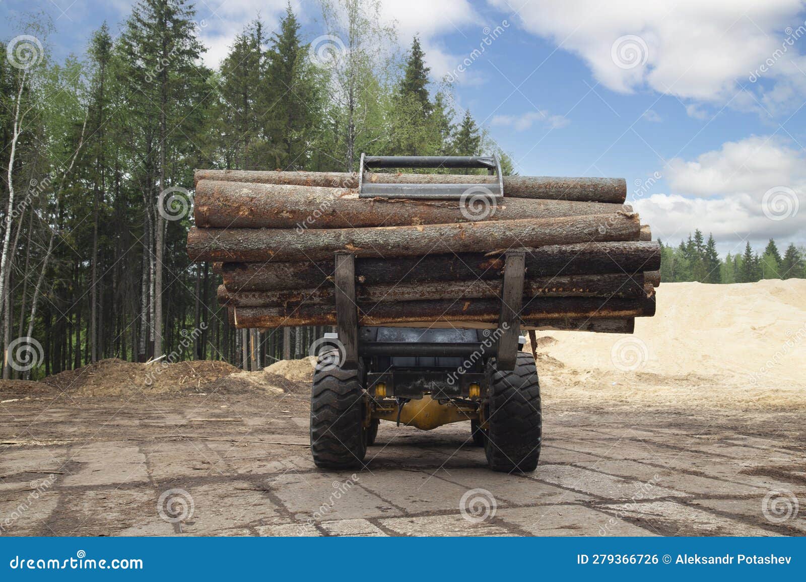 Loading Logs with a Special Loader.Timber Products Warehouse on a ...