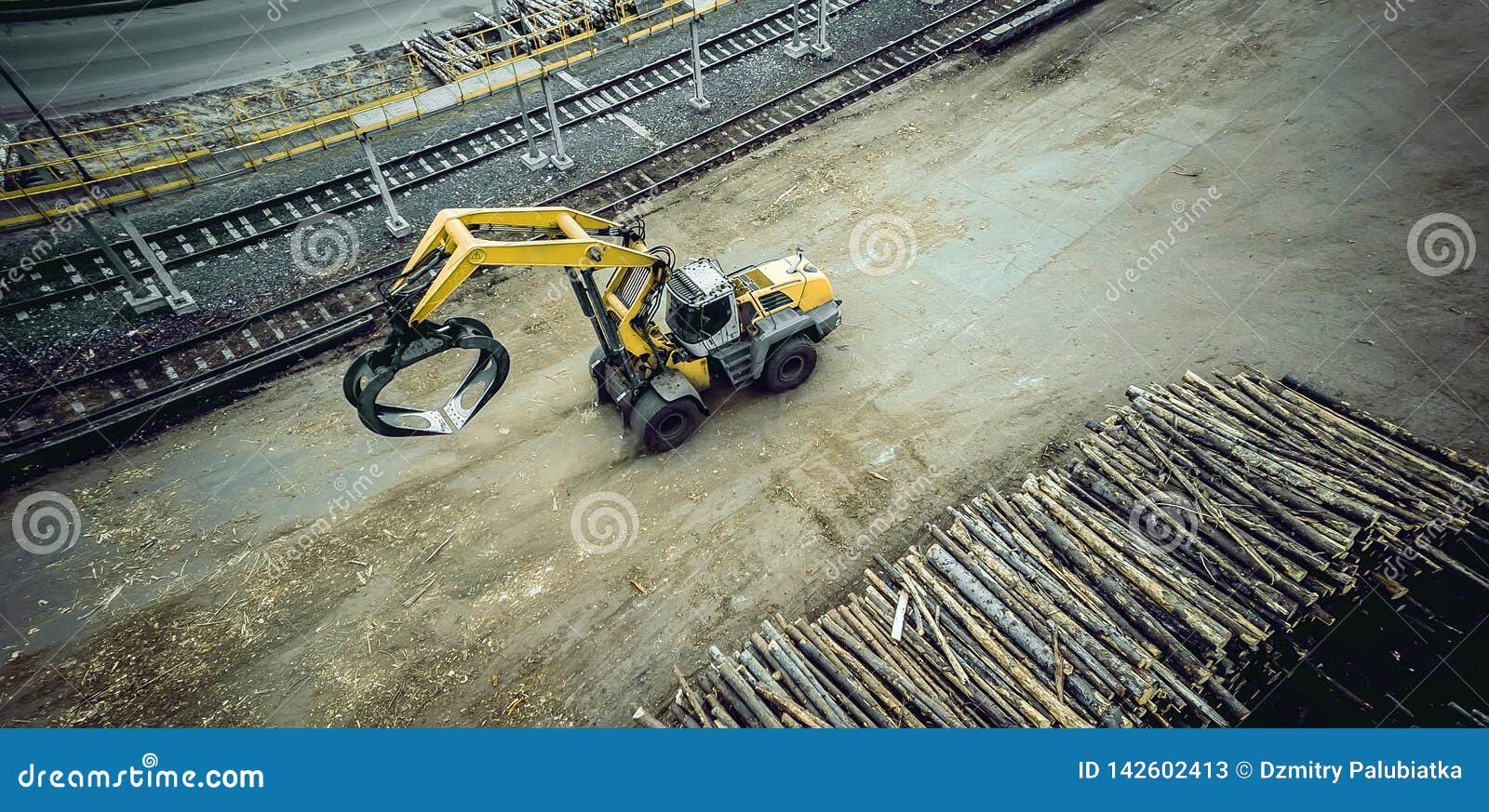 Loading Logs With A Special Loader.Timber Products Warehouse On A ...
