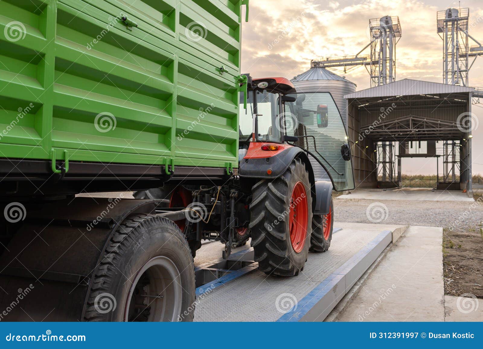 Tractor and Trailer beside Grain Silos Stock Image - Image of modern ...