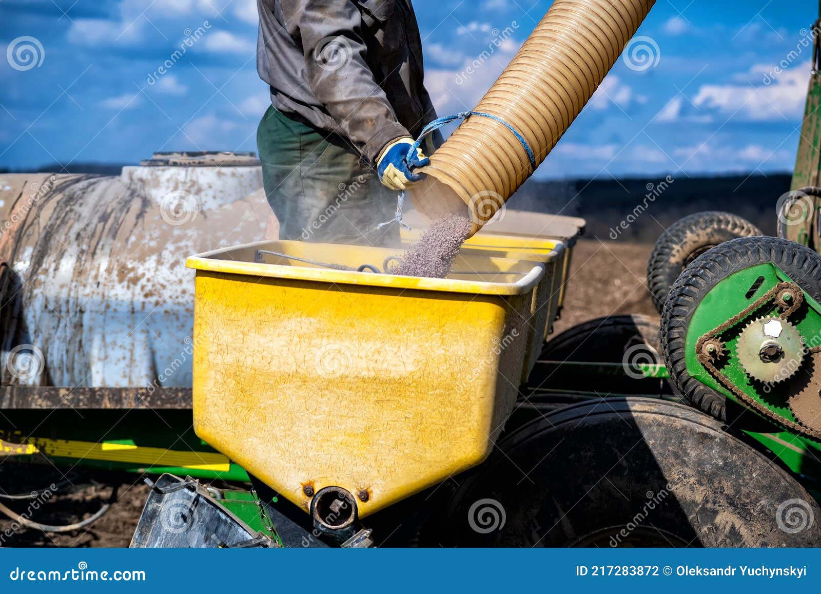 Loading of Mineral Fertilizer into the Hopper of the Sowing Unit Stock ...