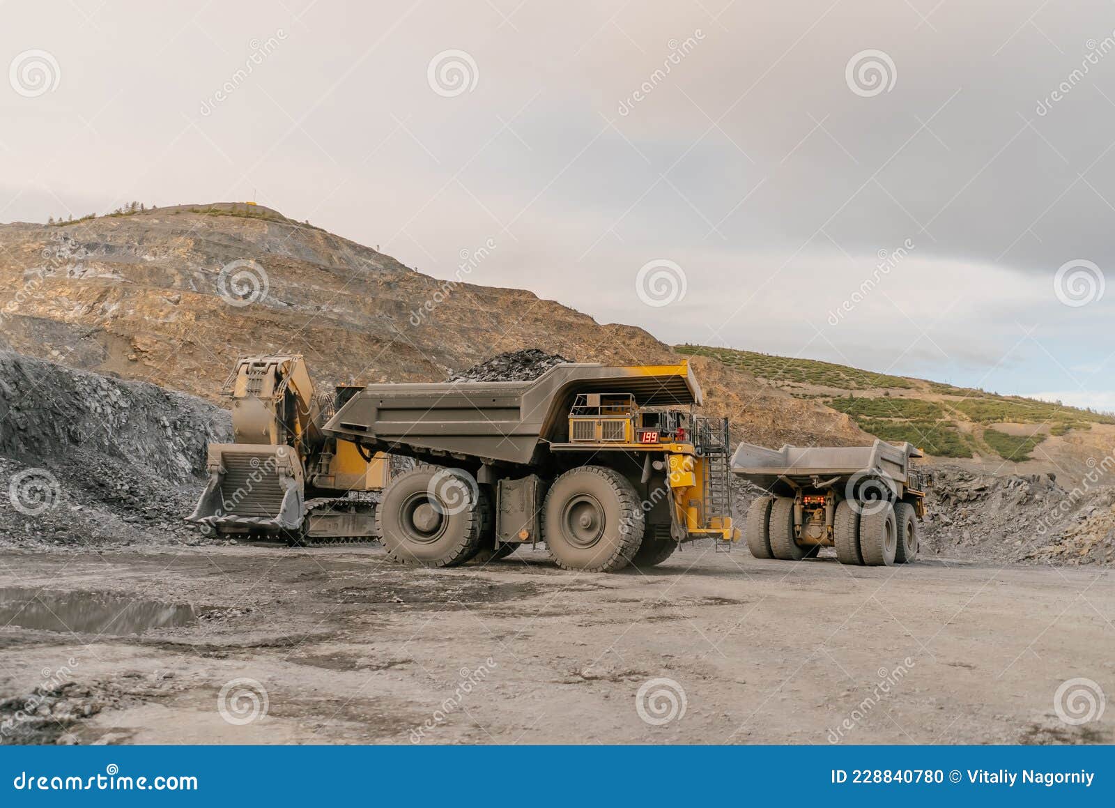 Loading Ore into Dump Trucks. Stock Photo - Image of loading, trucks ...
