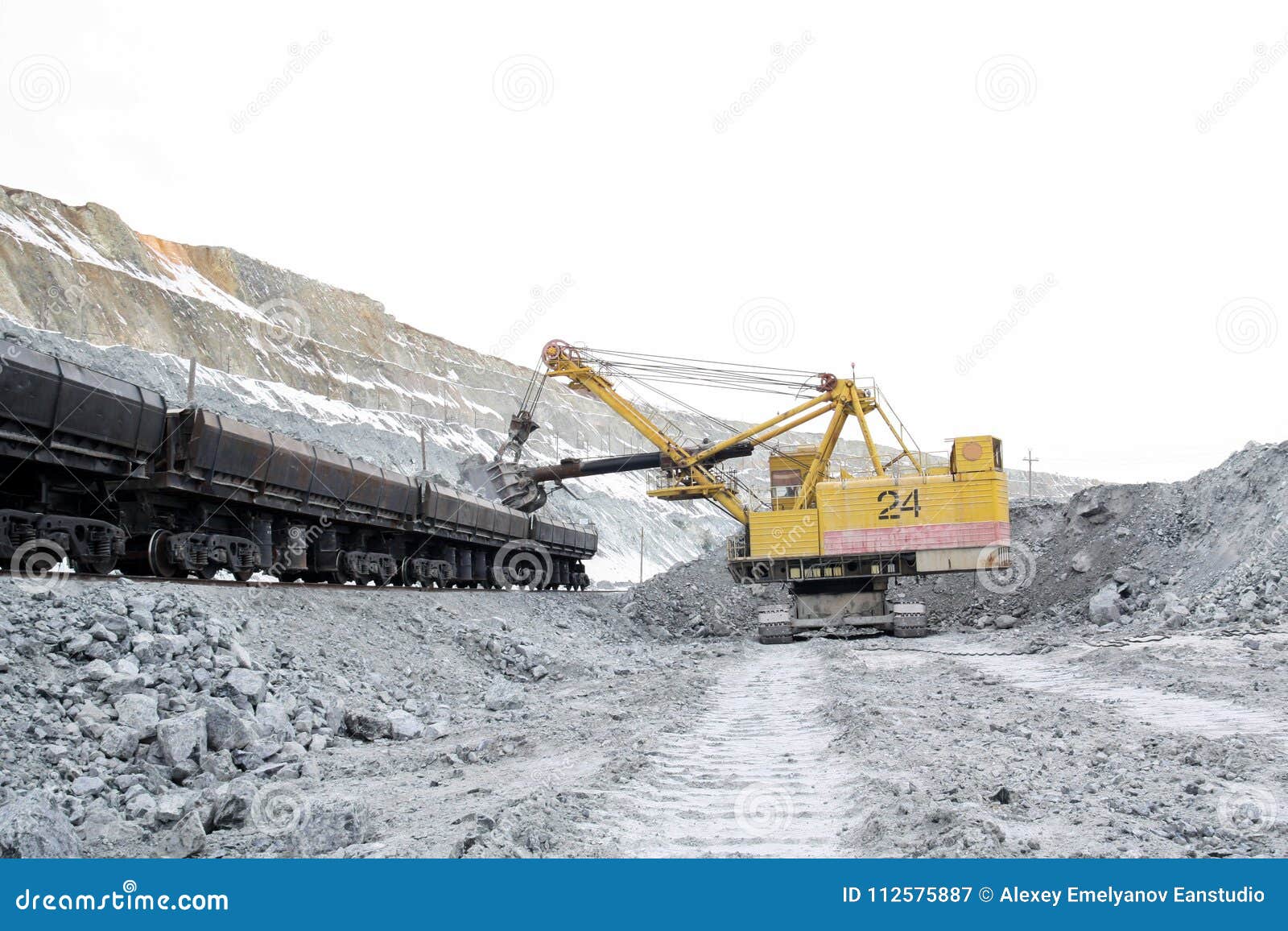 The Excavator Loads the Stones into the Cars. Stock Image - Image of ...