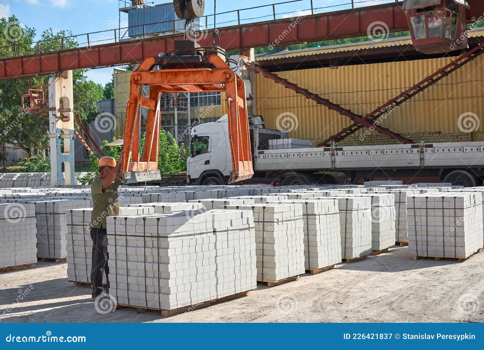 Loading Pallets with White Brick on a Truck with a Long Body. Stock ...