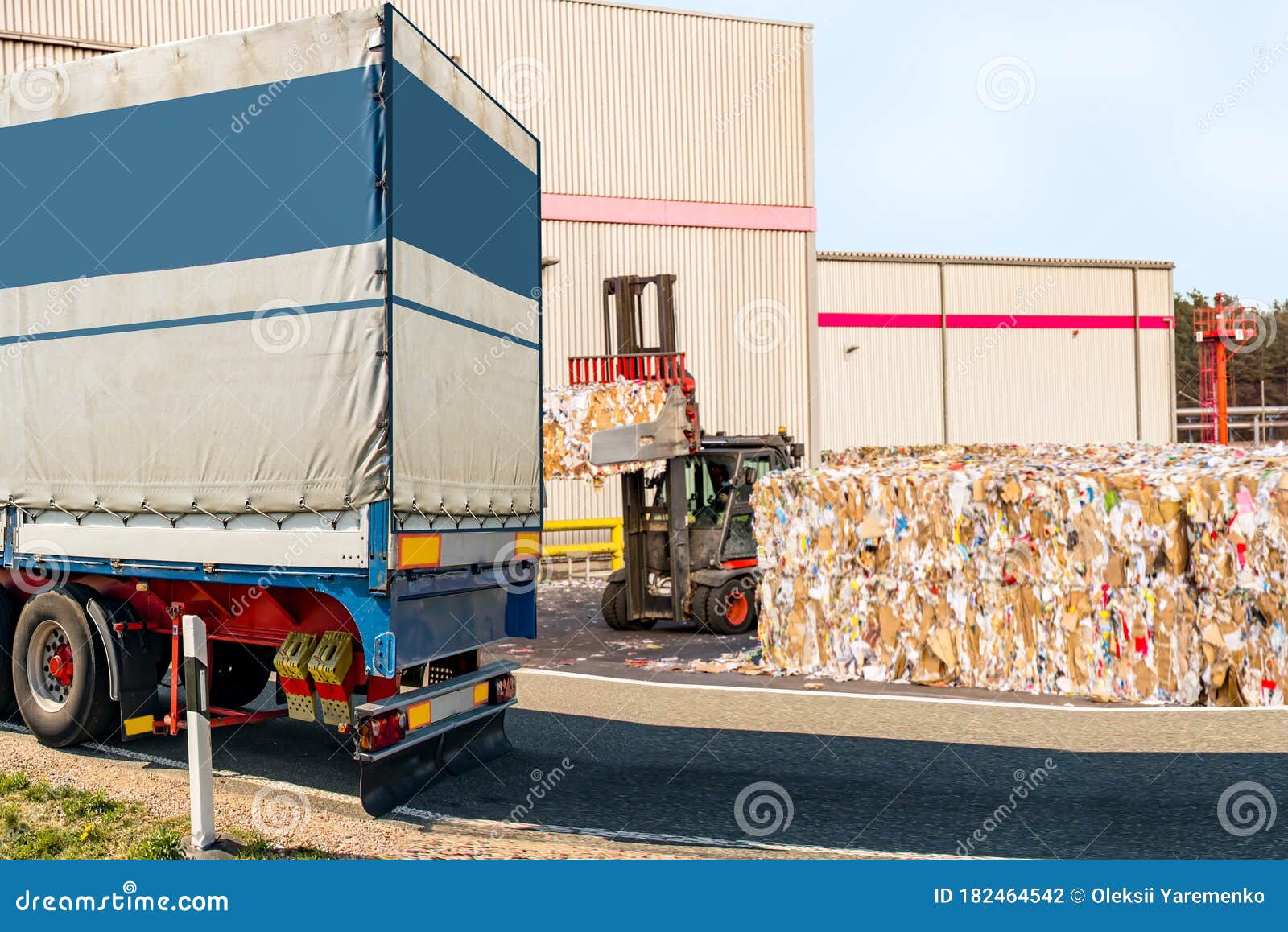 Loading Paper into the Trailer for Processing. Cargo Delivery Stock ...