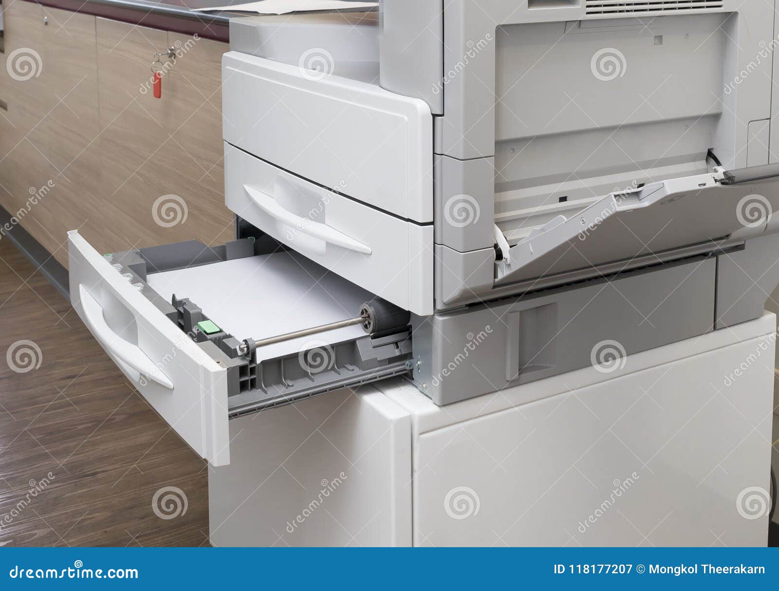 Loading Paper Tray of the Photocopier at the Office with Full Access ...