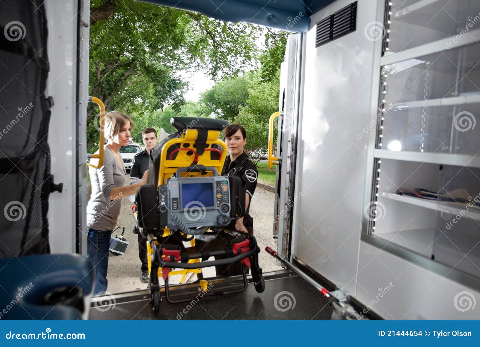 Loading Patient in Ambulance Stock Photo - Image of stretcher ...