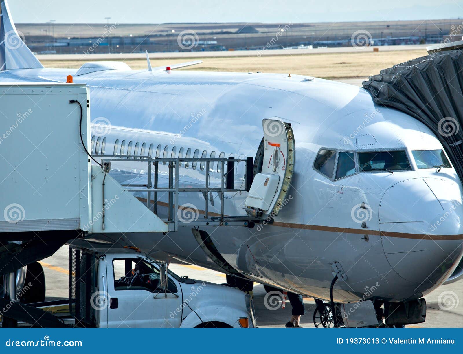 Loading a plane stock image. Image of commercial, ship - 19373013
