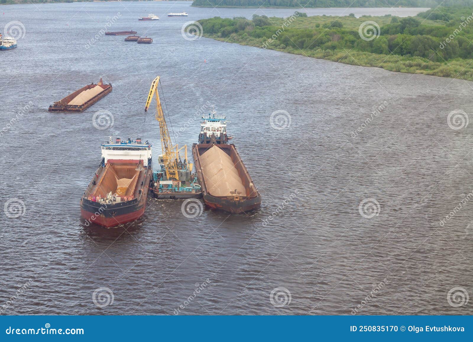 Loading Sand into a Barge on the River, Transporting Cargo by Water ...