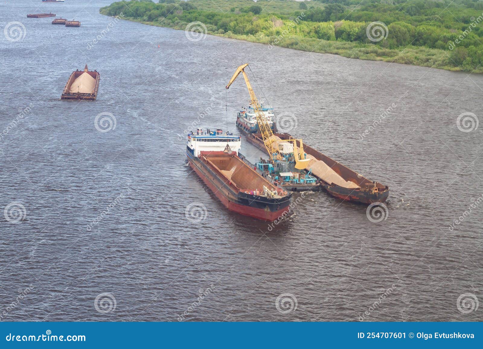 Loading Sand into a Barge on the River, Transporting Cargo by Water ...