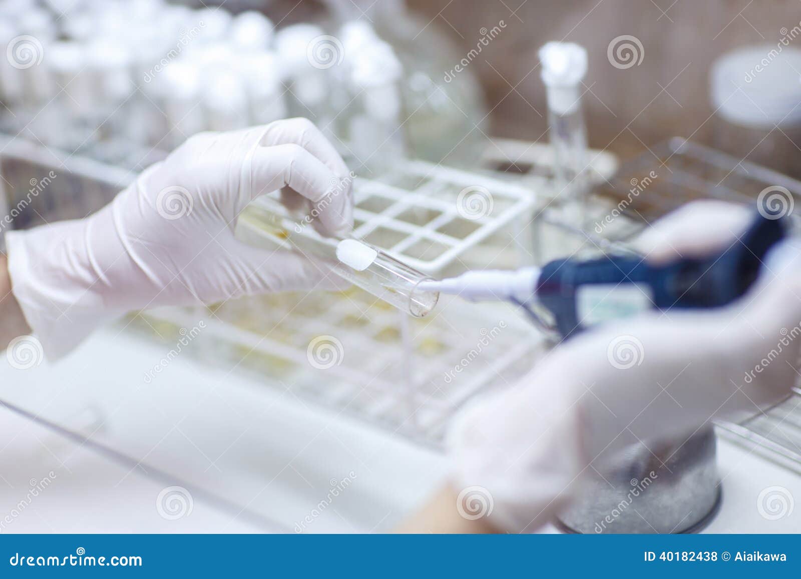 Loading Stripe of Samples for DNA Analysis Stock Photo - Image of gown ...