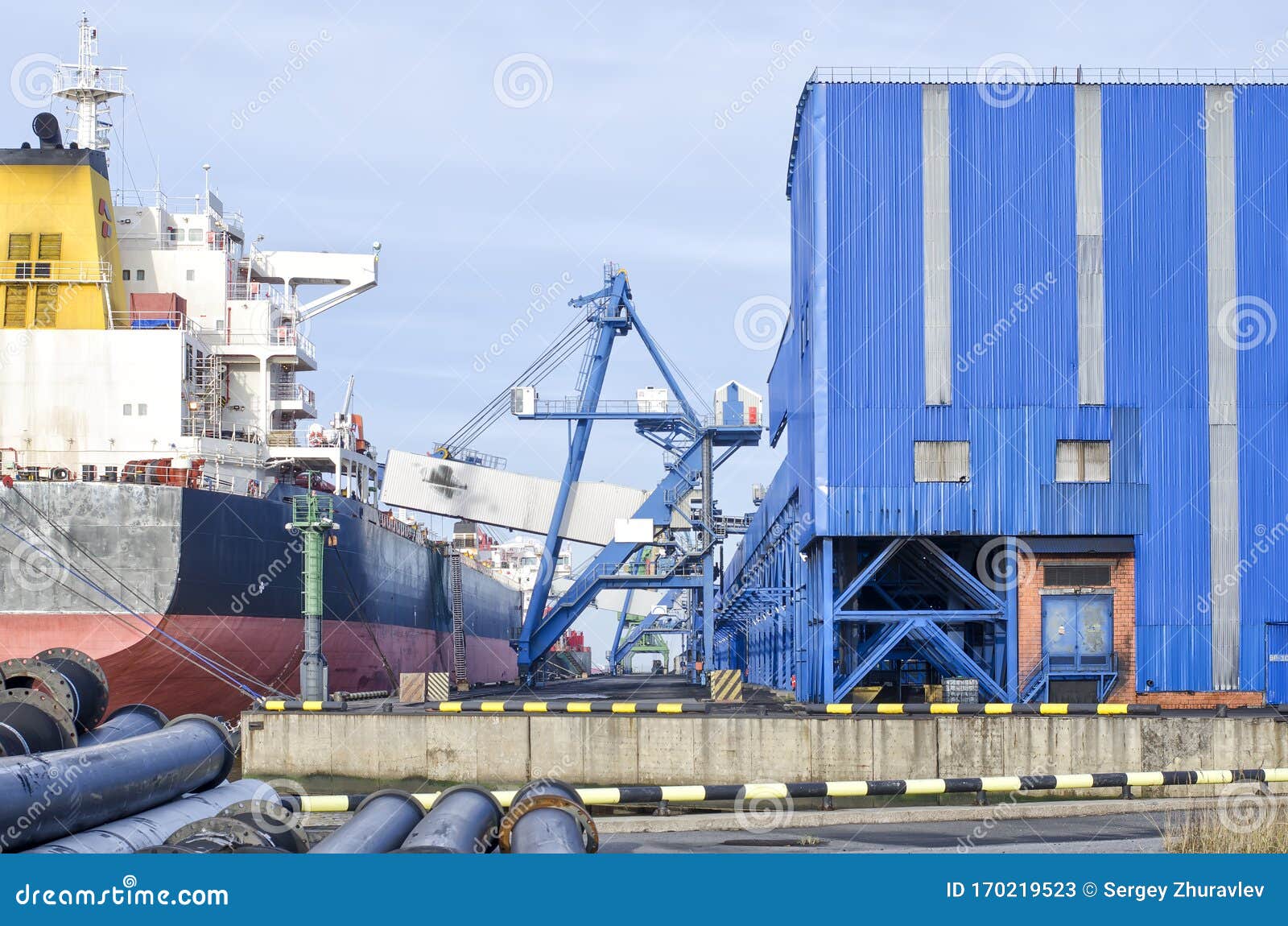 Loading Terminal of the Seaport. Loading Goods on an Ocean Ship Stock ...