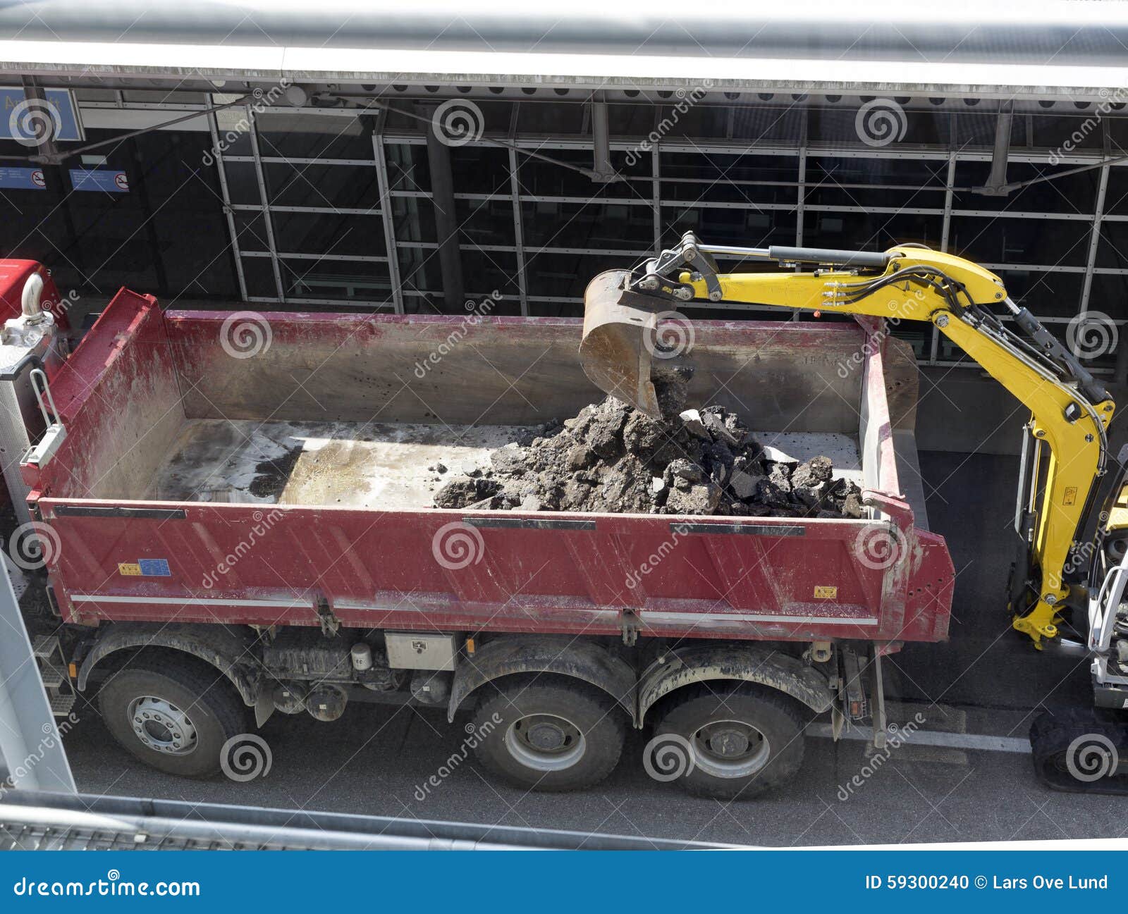 Loading the trailer stock photo. Image of digger, machines - 59300240