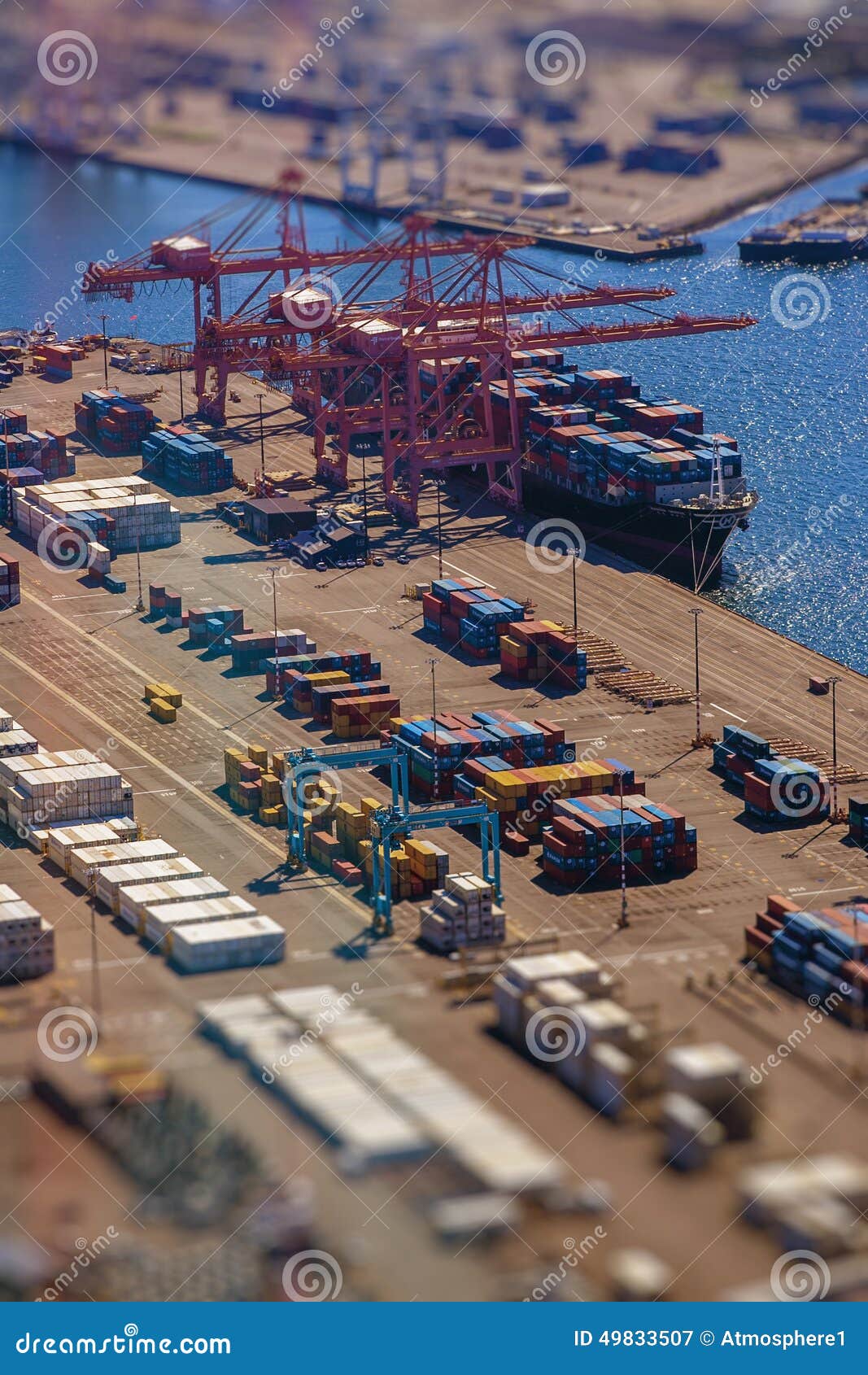 Loading a Transport Ship with Cargo, Containers, with Tilt-shift Lens ...