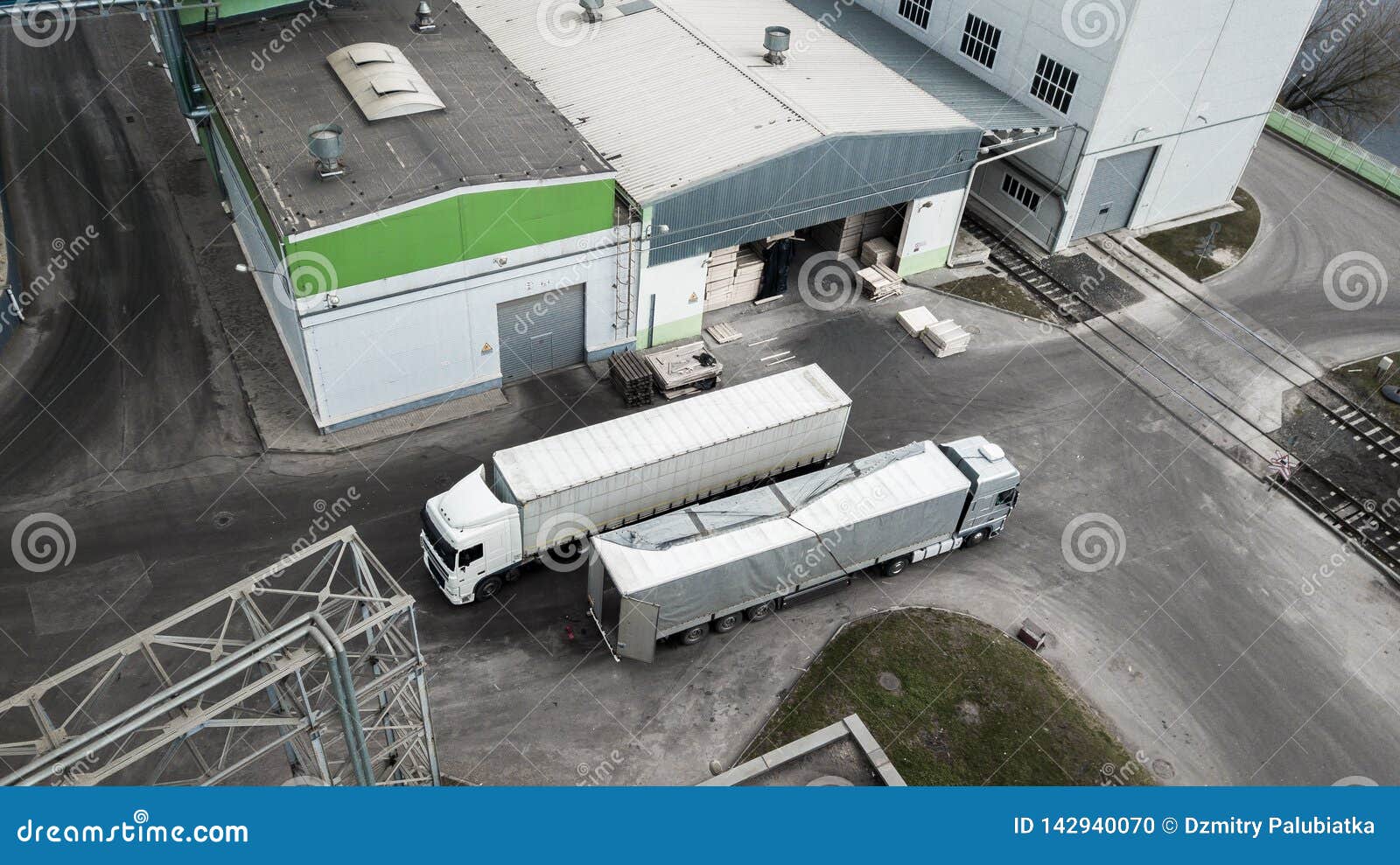 Logistic Concept. Loading Trucks in the Factory Warehouse Stock Photo ...