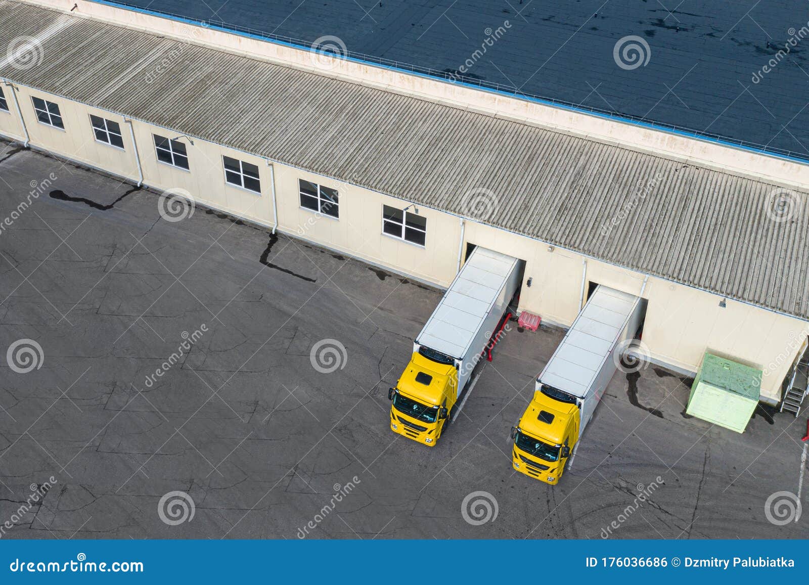 Loading Trucks in a Logistics Center Top View from a Drone Stock Photo ...