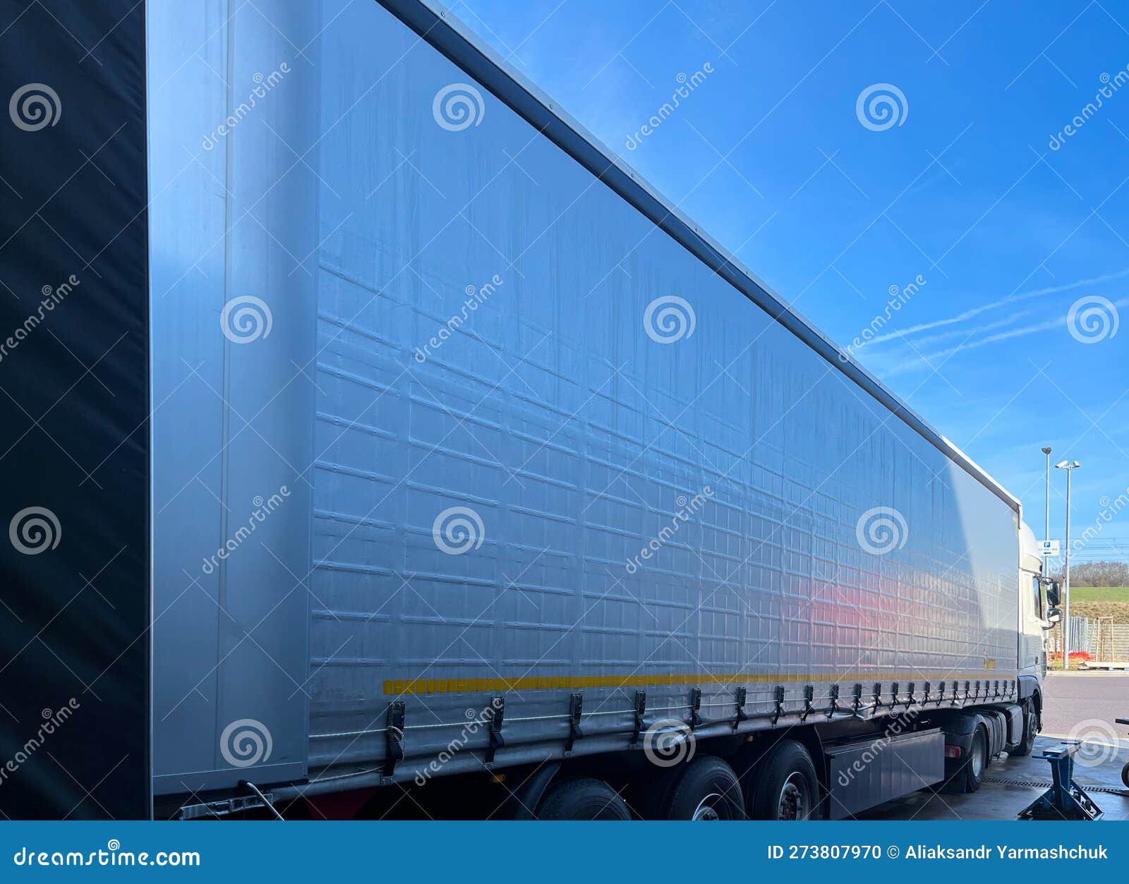 Loading or Unloading Cargo in a Tractor Trailer on a Ramp Stock Photo ...