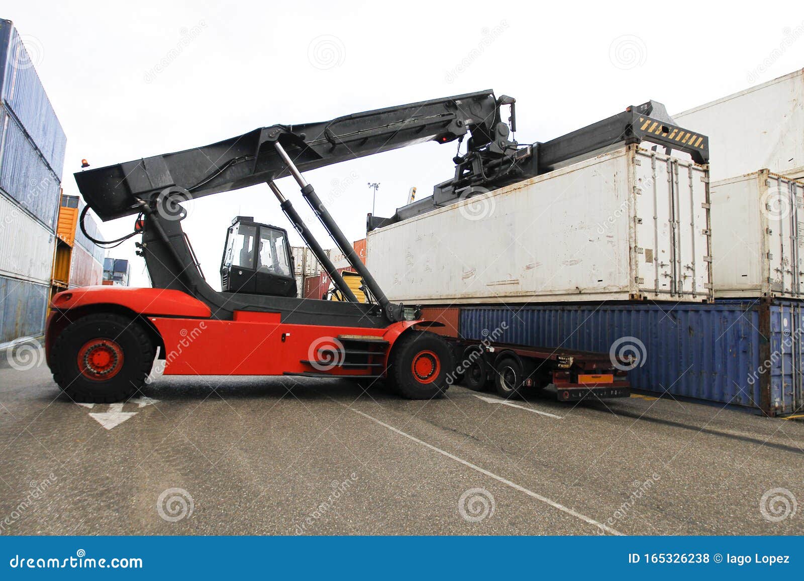Loading and Unloading of Containers in the Port Stock Photo - Image of ...