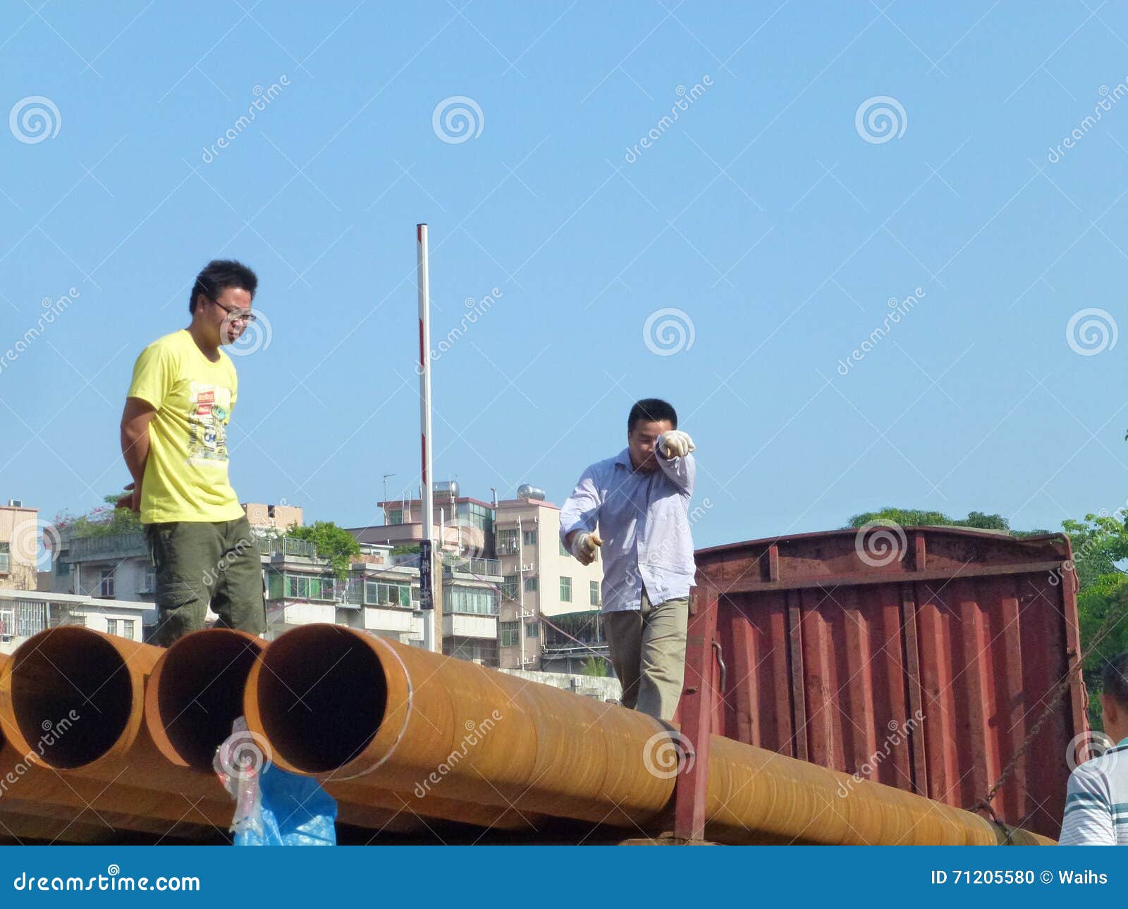 Loading and Unloading Steel Pipe Editorial Image - Image of workers ...