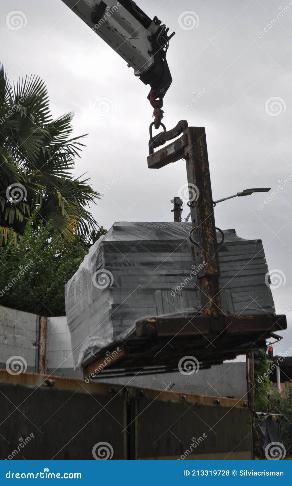 Loading or Unloading of Stone Tiles Stock Photo - Image of industrial ...