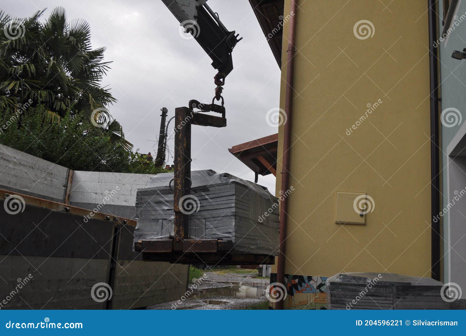 Loading or Unloading of Stone Tiles Stock Image - Image of paving, rock ...