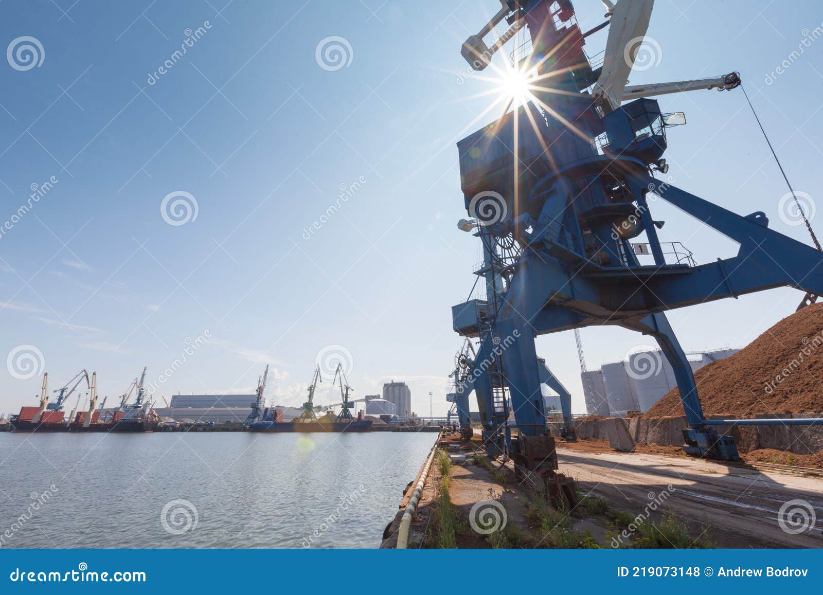 Loading and Unloading of Vessels Stock Photo - Image of blue ...