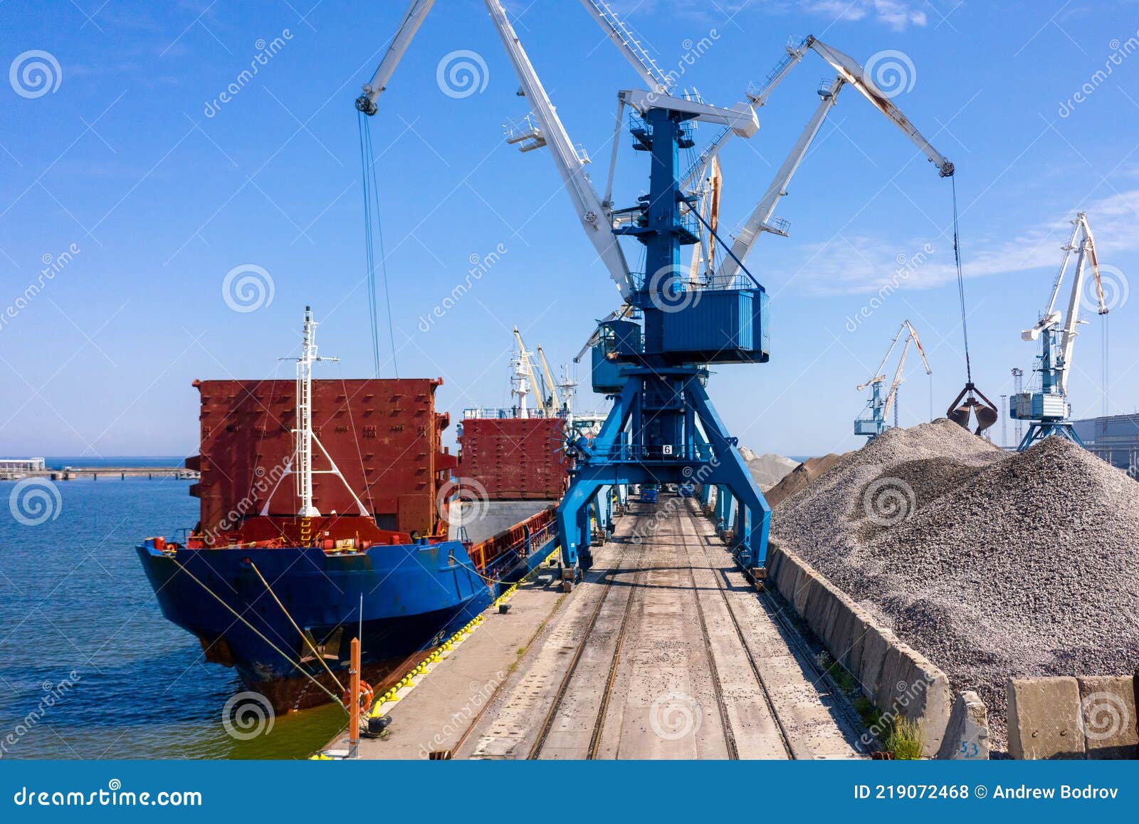 Loading and Unloading of Vessels Stock Photo - Image of port, shipping ...