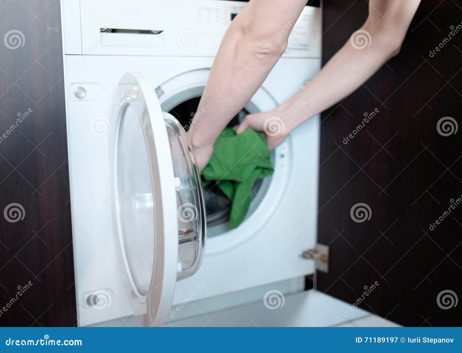 Loading the washer stock image. Image of person, detergent - 71189197