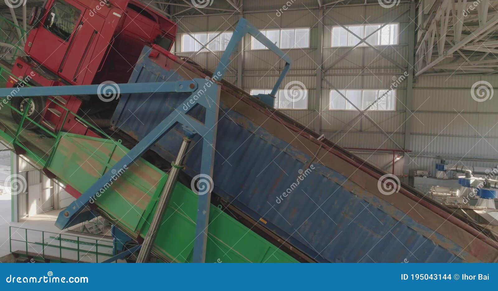 Loading Wheat into an Elevator. Unloading Wheat from a Truck To a Silo ...