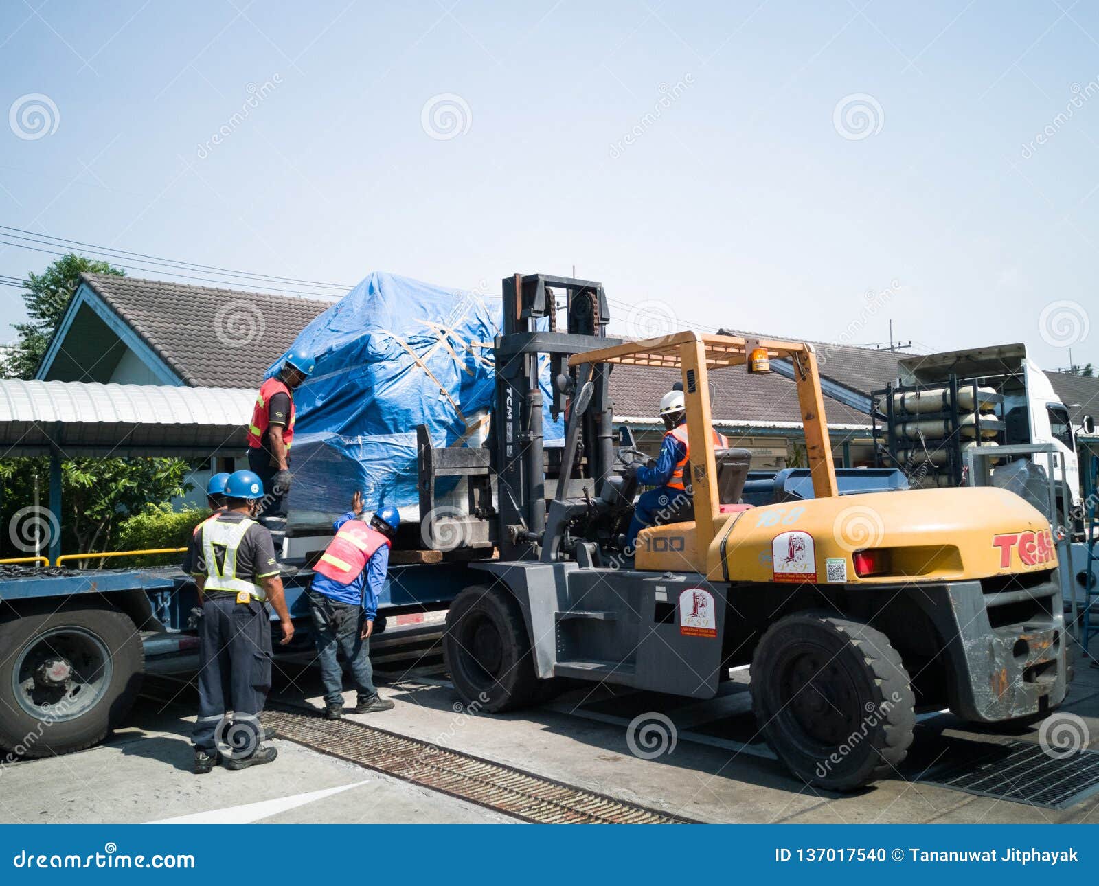 Loading Works. Forklift with Machine Loading and Lorry Truck Editorial ...