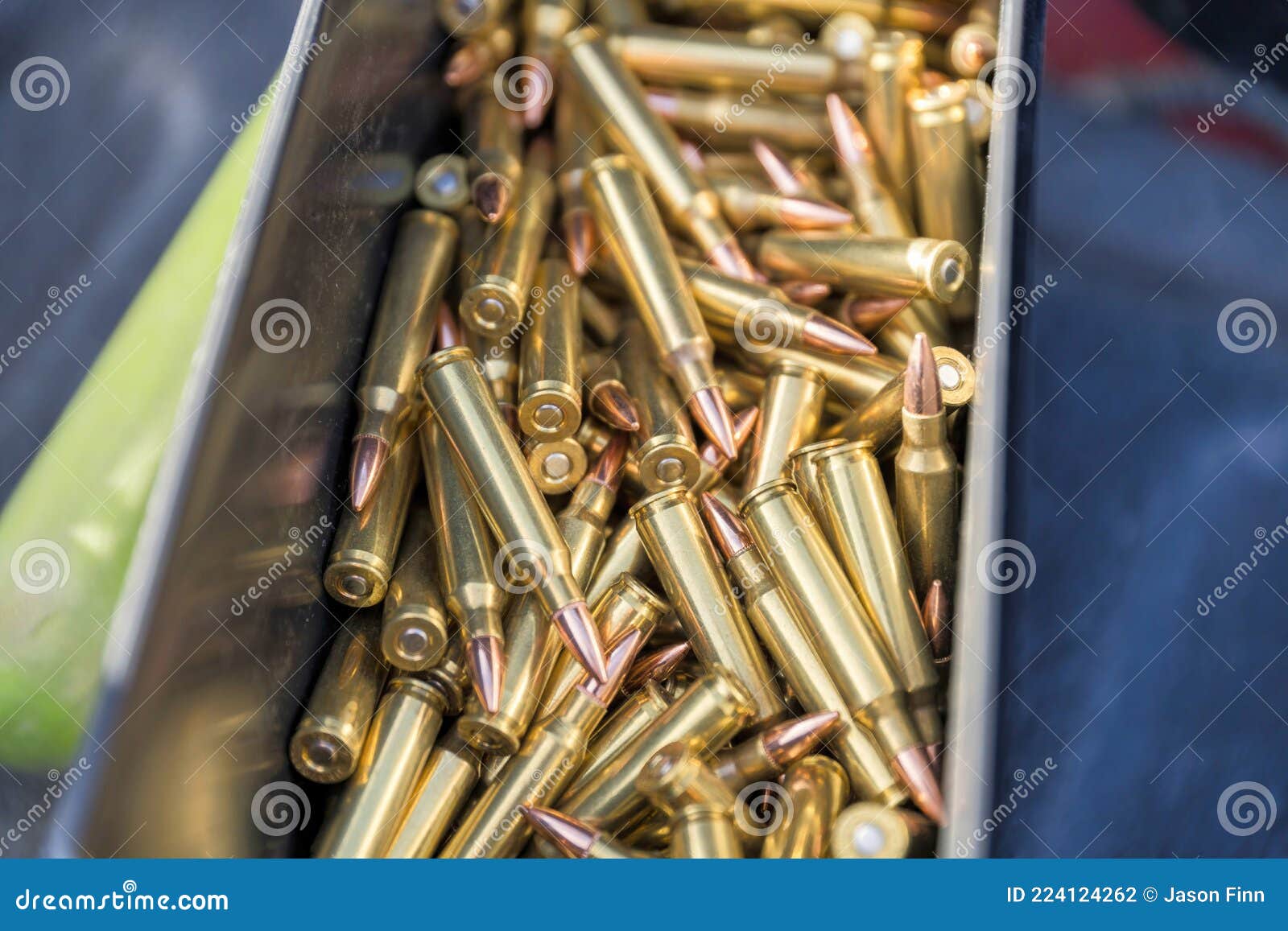 Loads of Long Sharp Bullets Inside Its Case with a Blue Cloth on the ...