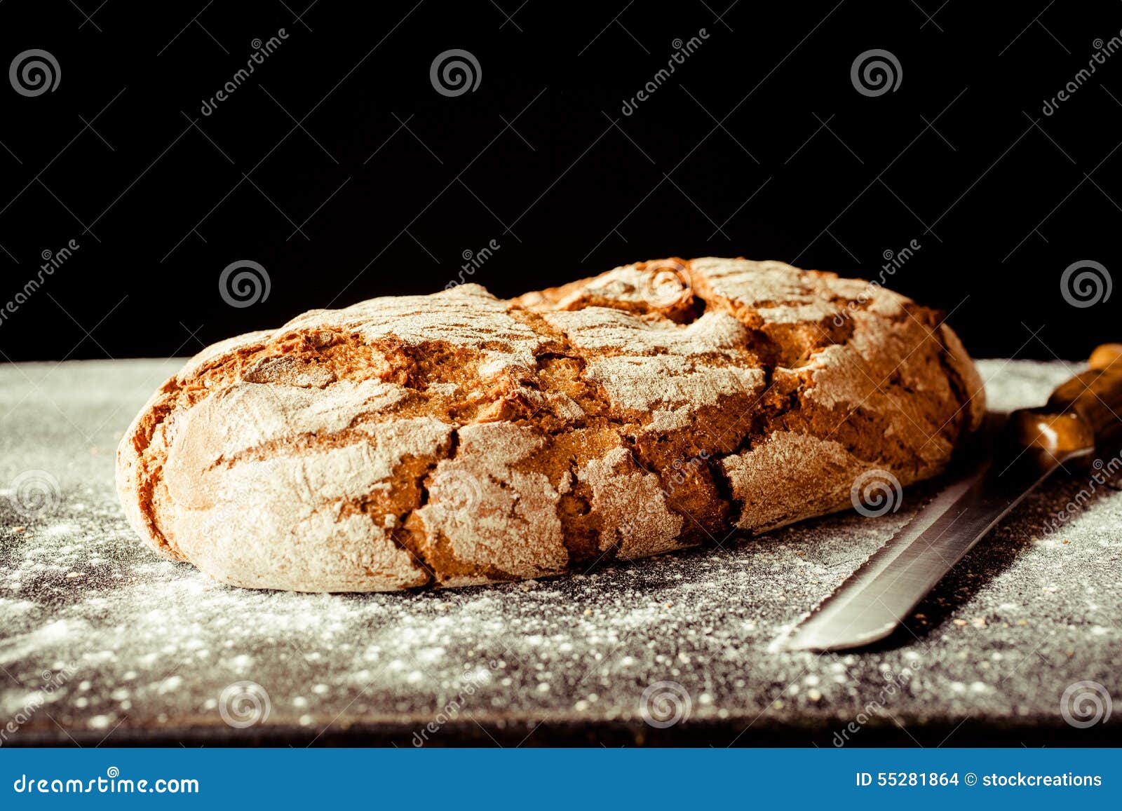 Loaf of Artisinal Cracked Wheat Bread with Knife Stock Photo - Image of ...