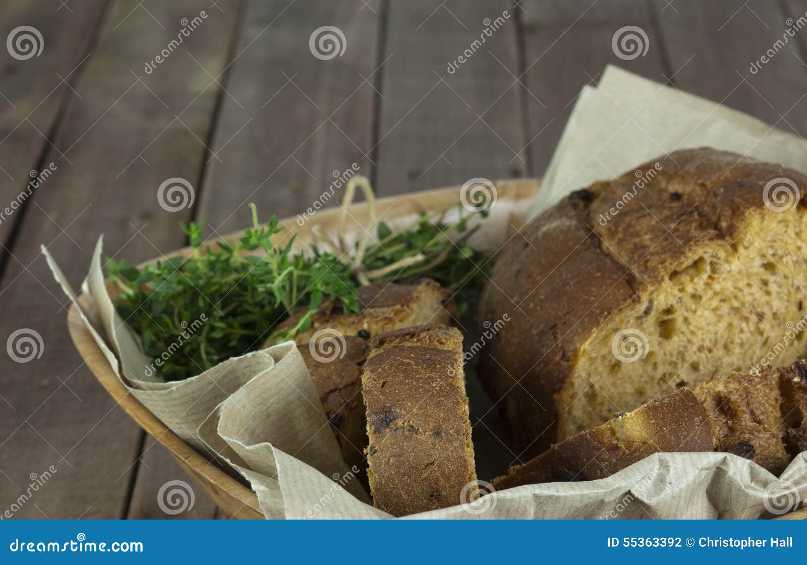 Loaf of bread in a basket stock photo. Image of organic - 55363392