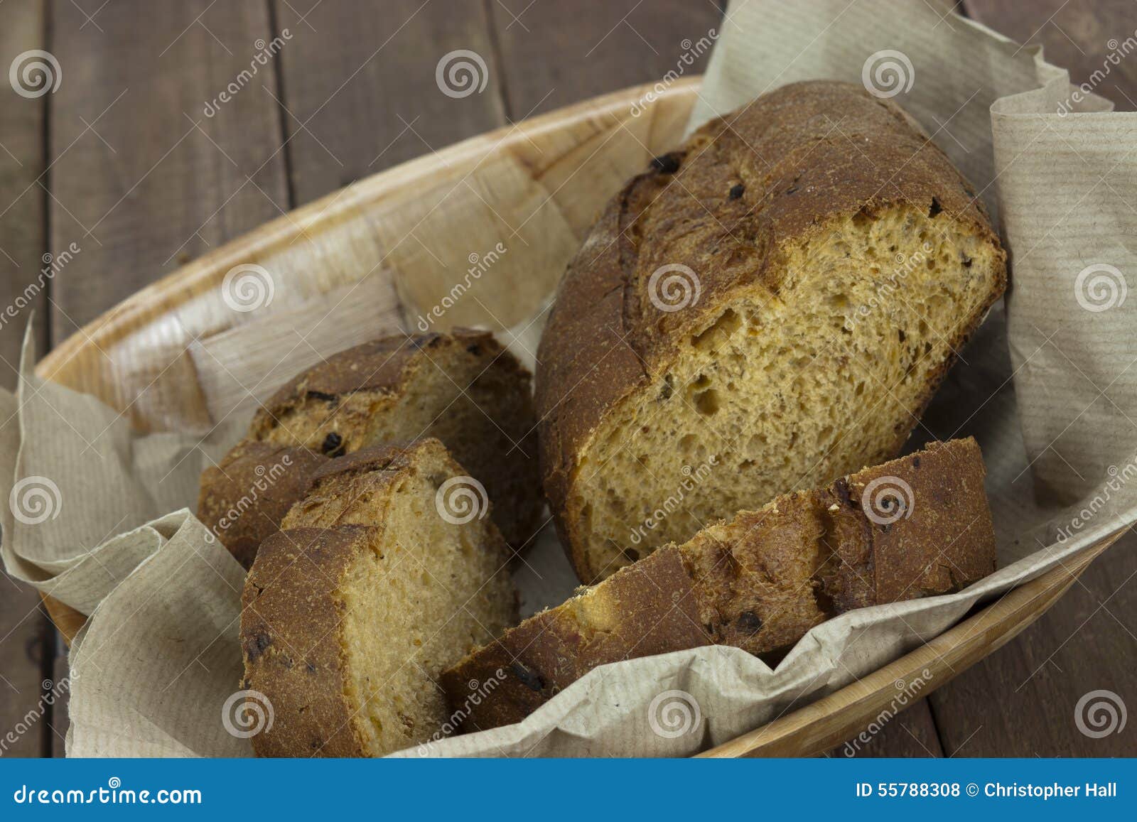 Loaf of bread in a basket stock photo. Image of wholemeal - 55788308
