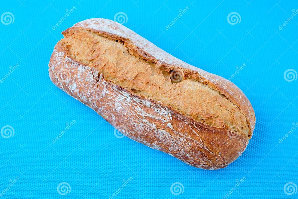 Loaf of Bread with Blue Background Stock Image - Image of homemade ...