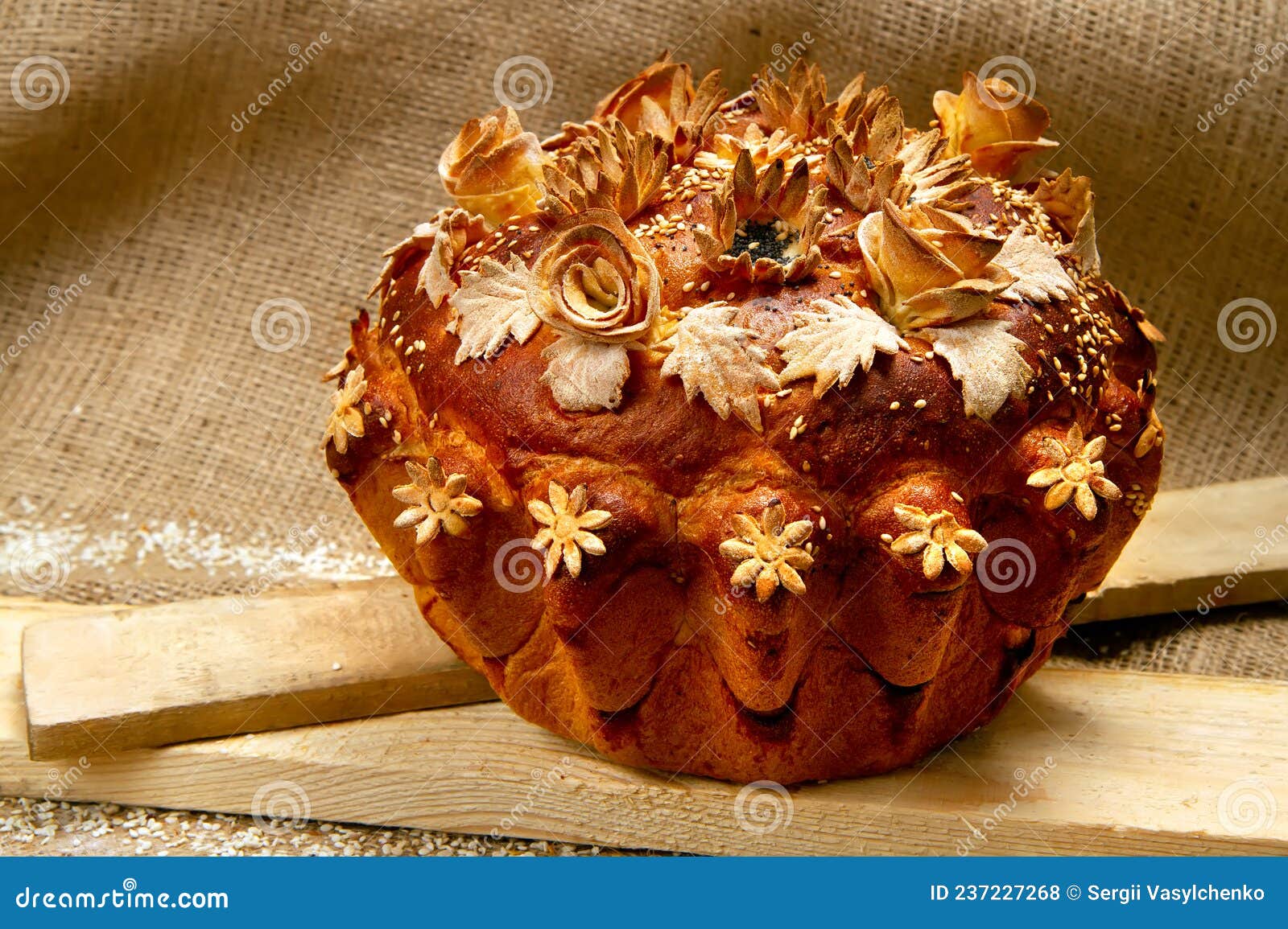 A Loaf of Bread Decorated with Flowers and Patterns. Stock Photo ...