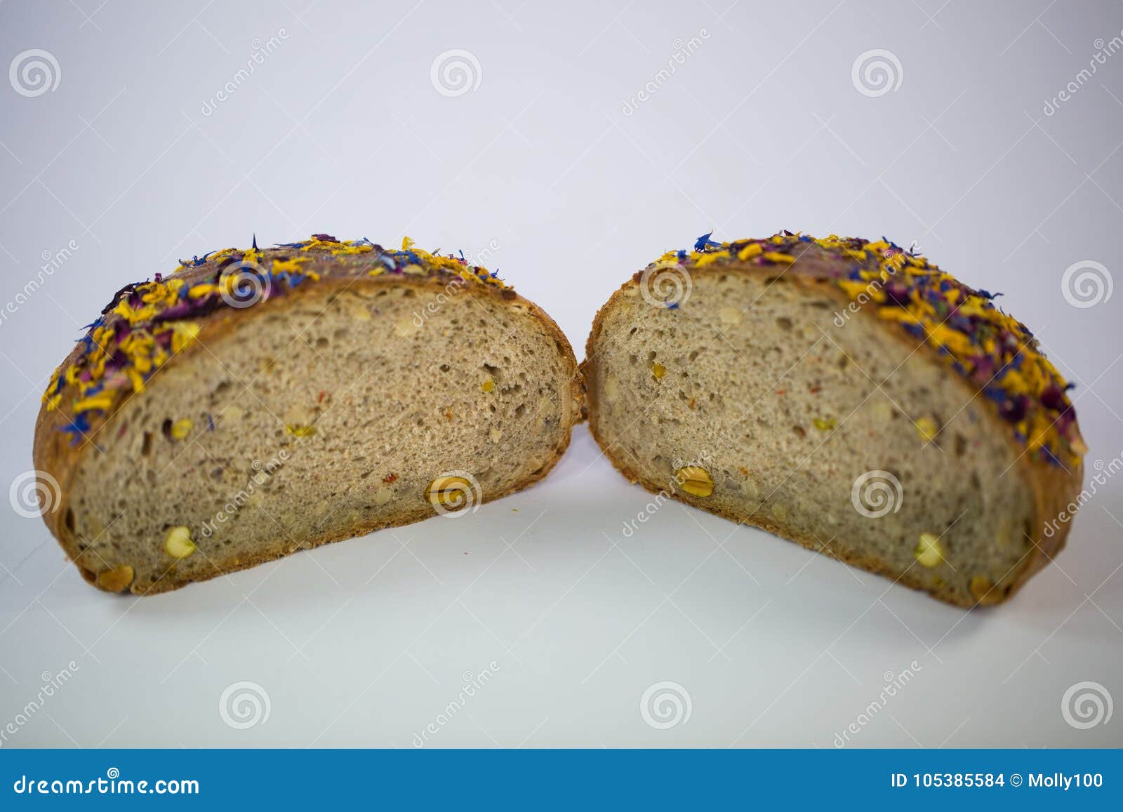 Loaf of Bread with Edible Flowers and Nuts Stock Photo - Image of oven ...