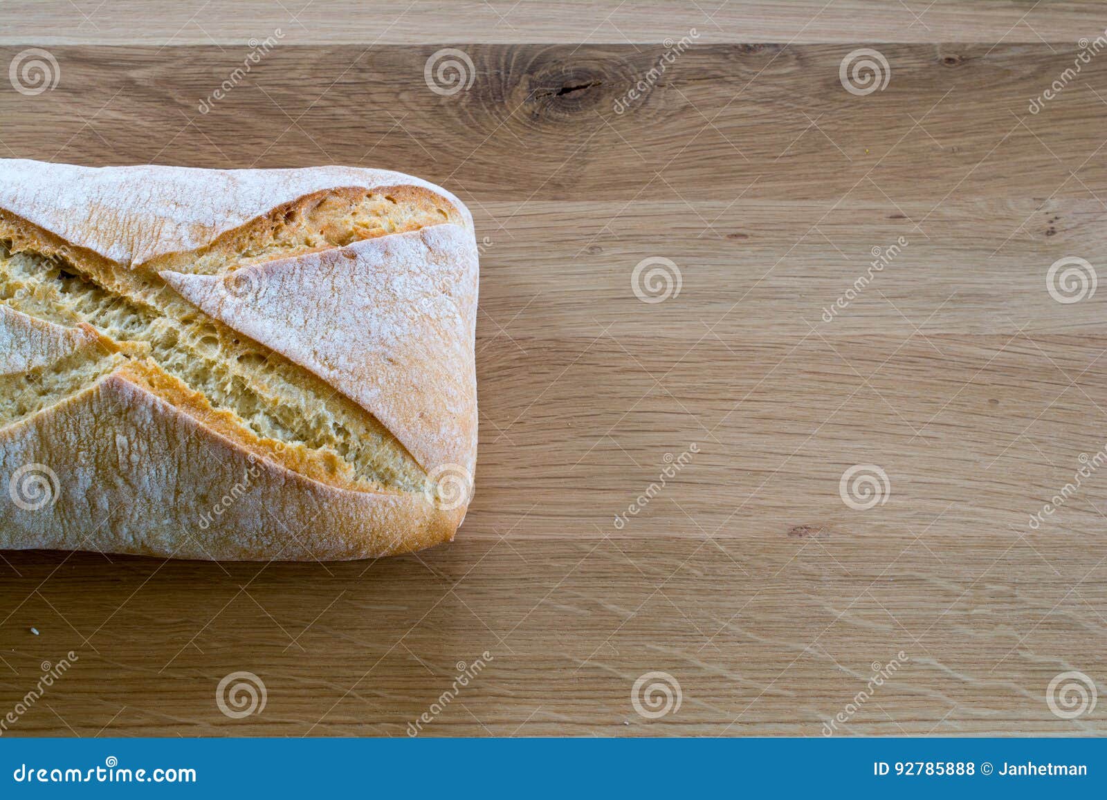 Loaf of Bread on Wooden Oak Table Top. Stock Photo - Image of breakfast ...