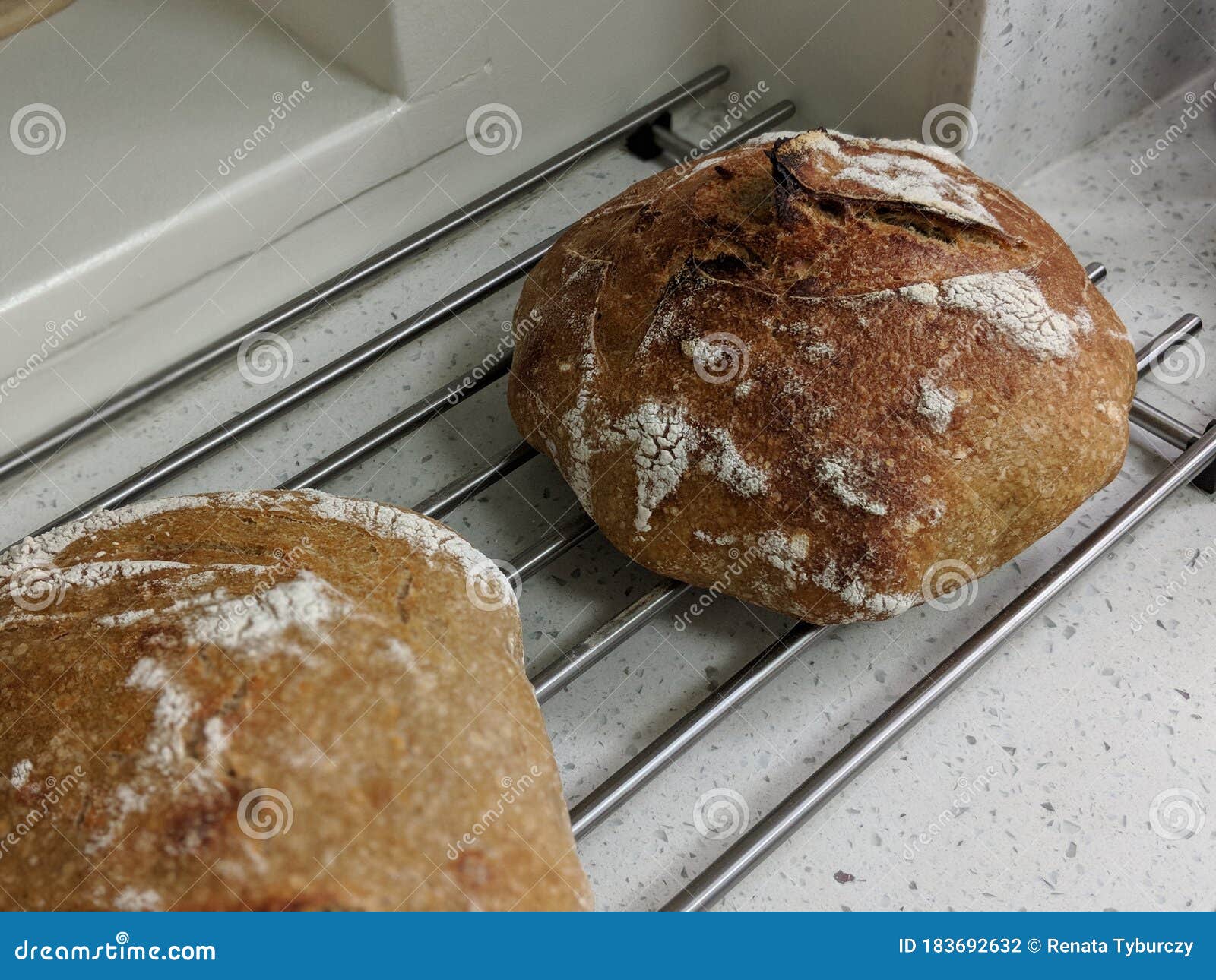 Loaf of Round, Crispy, Freshly Baked Homemade Bread Stock Photo - Image ...