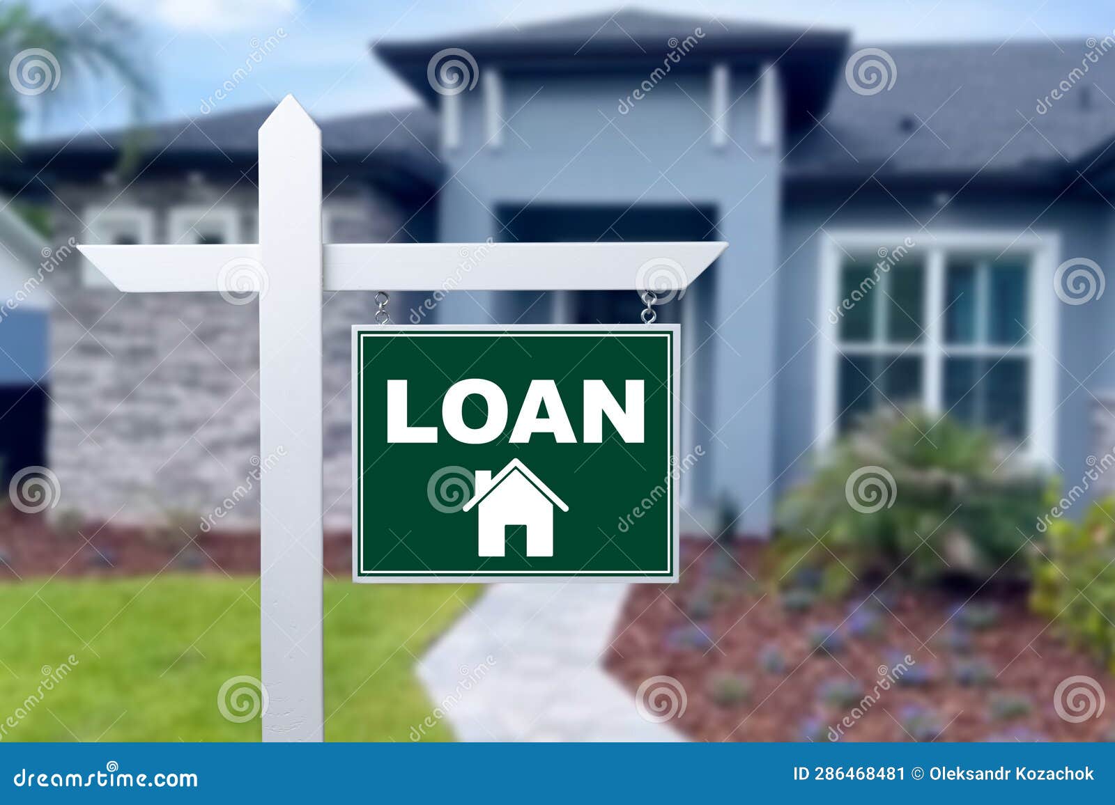LOAN Sign Against a House. Close-up. Stock Image - Image of selling ...