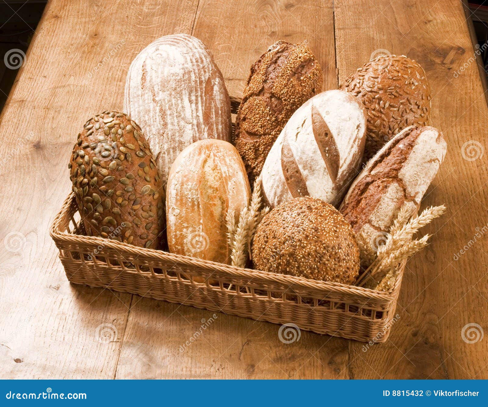 Loaves of Bread in a Basket Stock Photo - Image of products, seeds: 8815432
