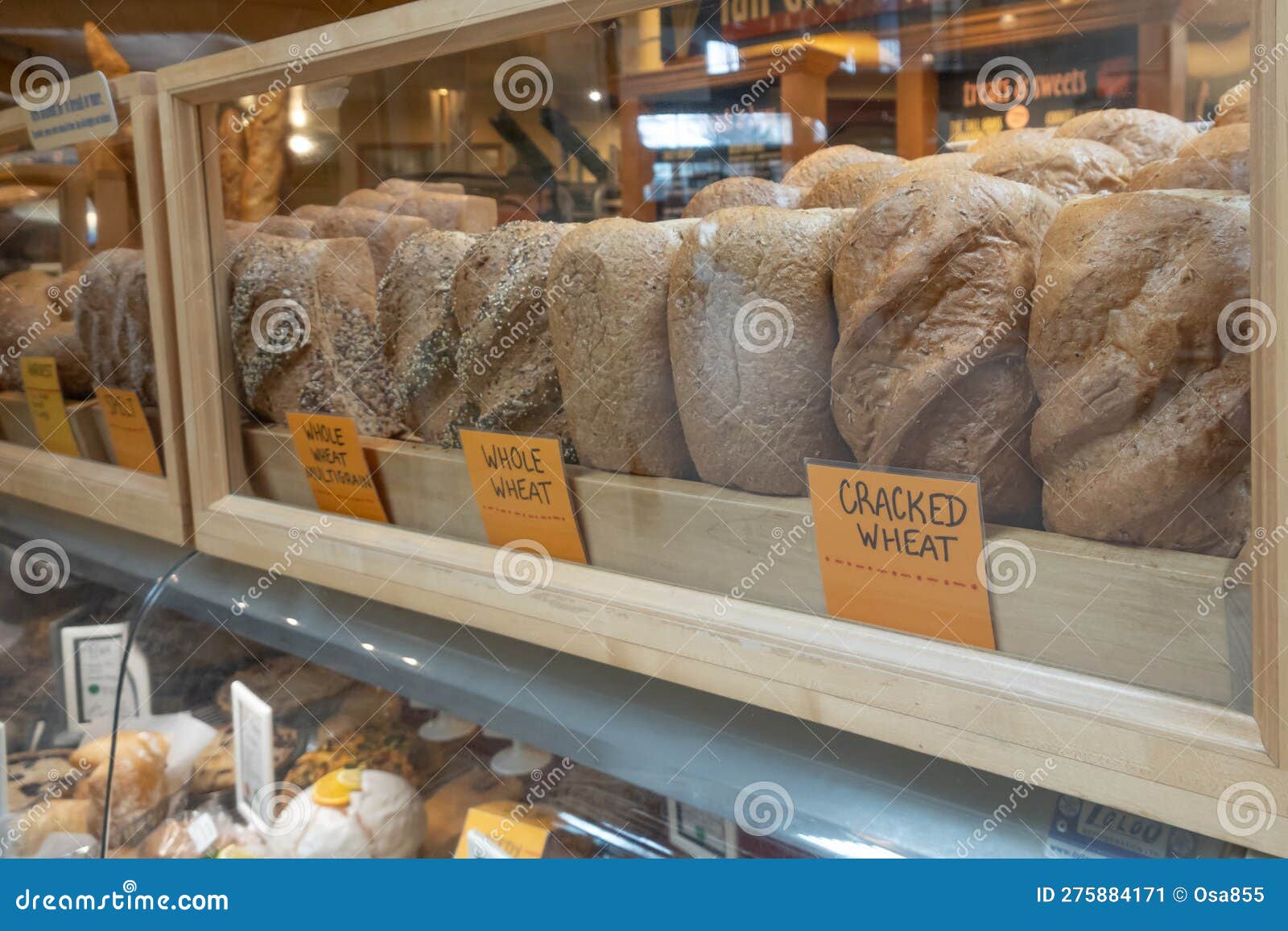 Loaves of Bread on Display in Bakery Stock Image - Image of brown ...