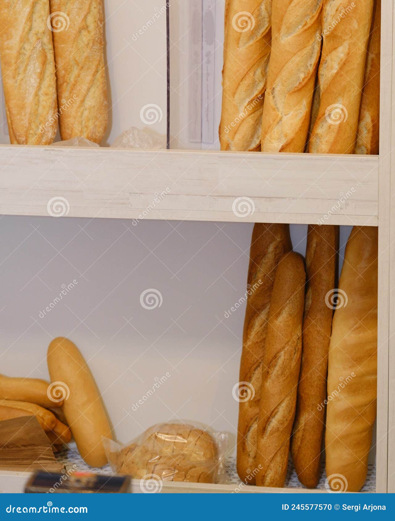 Loaves of Bread Displayed on the Shop Window Stock Photo - Image of ...