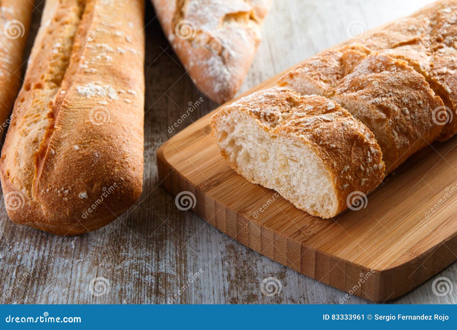 Loaves of Bread on Work Table Stock Image - Image of food, isolated ...