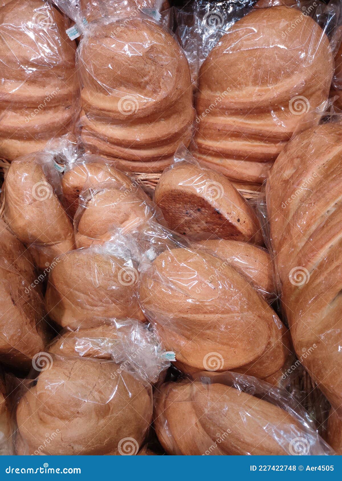 Loaves of White Bread Packed in Cellophane Stock Photo - Image of white ...