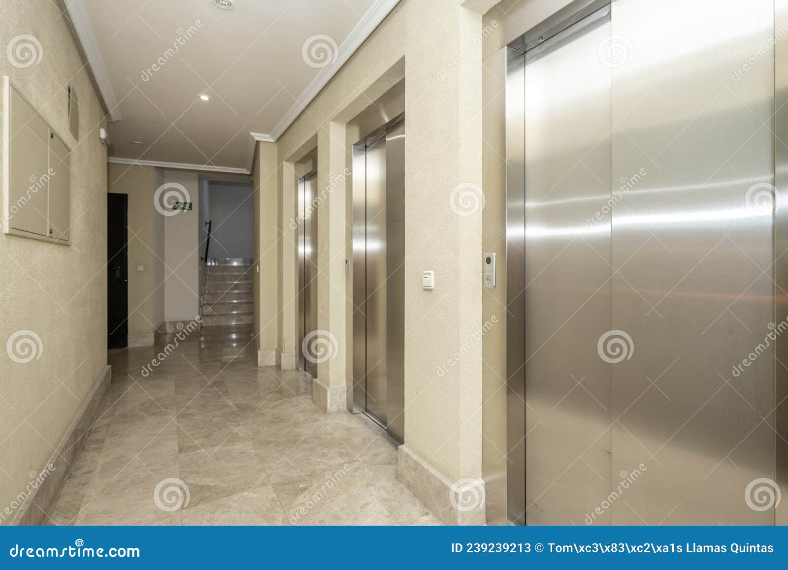 Lobby of a Building with Three Elevators Stock Image - Image of sliding ...